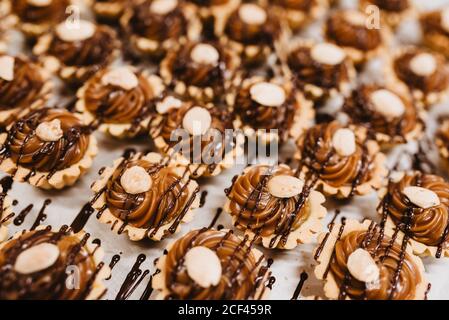 Closeup set of yummy pastry arranged on parchment paper Stock Photo - Alamy