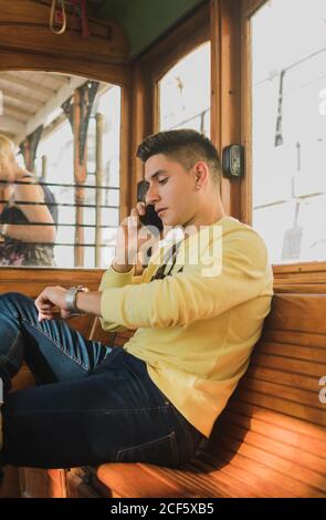 Guy talking on the phone Stock Photo - Alamy