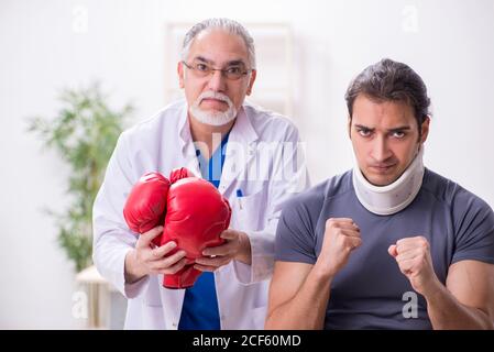 Young injured boxer visiting doctor traumatologist Stock Photo - Alamy
