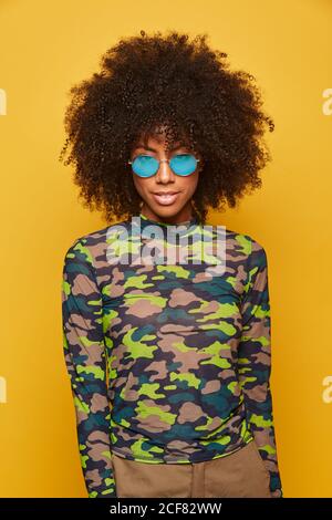Young afro american woman wearing winter sweater over isolated ...