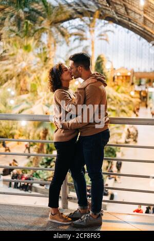 Young man looking at the rest of path during a break of his outdoor ...