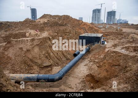 Connecting a trench drain to a concrete manhole structure at ...