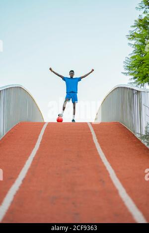 Football player celebrating Stock Photo - Alamy