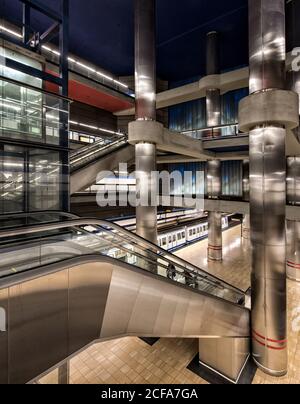 A vertical shot with long exposure of a subway tunnel with the lights ...