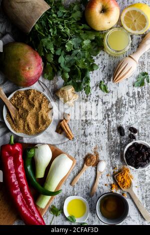 Top view of delicious homemade mango cheesecake in ceramic dish with ...