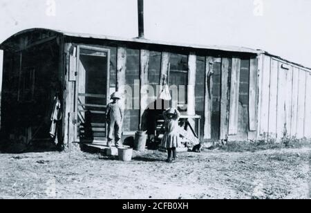 Shack in which the Reibers live, 10 x 15 ft. with a small shed attached ...