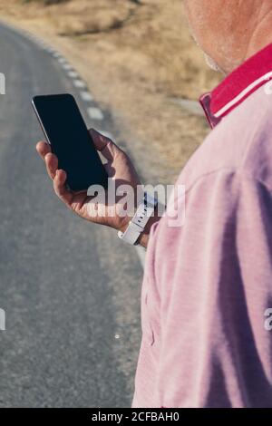 close up of old man texting on smartphone at home Stock Photo - Alamy