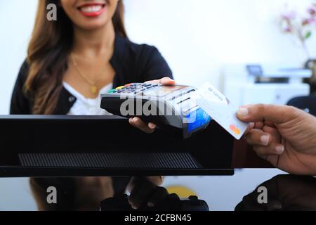 Atm & Debit Card Swipe Machine QNB Stock Photo - Alamy