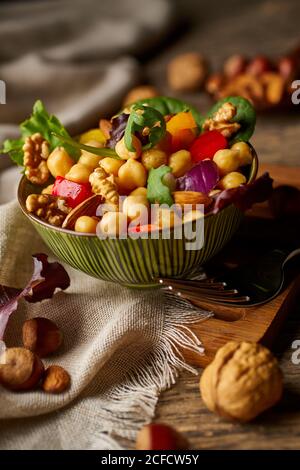 From above appetizing colorful cut vegetable mix with spinach lentils ...