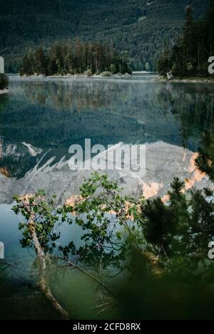lake Eibsee with Sassen Island in front of Zugspitze Massif, Germany ...