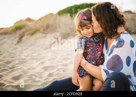 Portrait of mother with little daughter playing computer games Stock ...