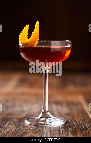 Martinez orange cocktail drink with red vermouth, liqueur, bitter ...