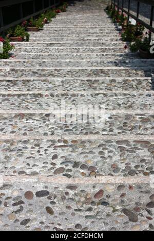 Staircase with a texture of small stones Stock Photo - Alamy
