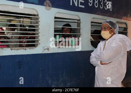 Police at work wearing mask and PPE kit Stock Photo - Alamy