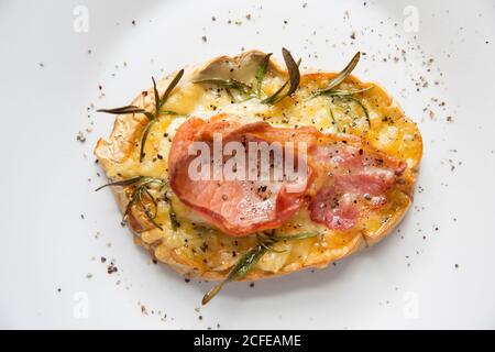 A slice of a giant puffball, Calvatia gigantea, that has been grilled ...