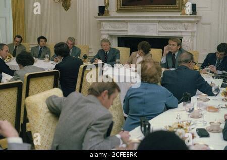 Members of the White House press corps work outside of the White House's James S. Brady Press ...