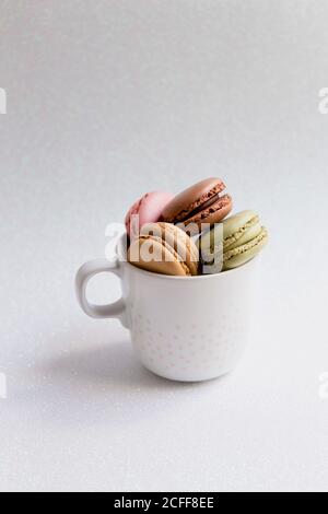 Macaroons on a wooden table Stock Photo - Alamy