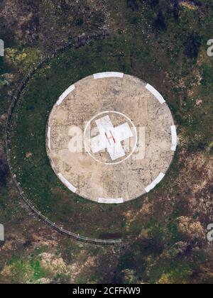 Aerial top view of helipad on the roof of a skyscraper iin downtown ...