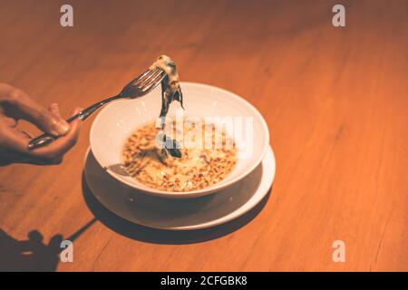 People use fork for pick Spinach cheese in the dish in the resraurant ...