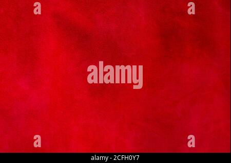 Velvet texture of seamless leather. Felt material macro. Red suede ...