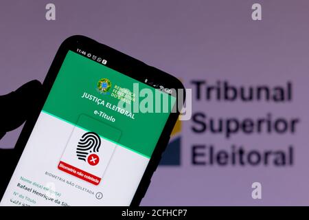 In this photo illustration the e-Título logo seen displayed on a ...