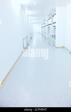 Long bright corridor in scientific laboratory building Stock Photo - Alamy