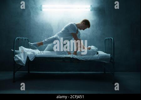 Female person strangles man, couple in quarrel, stress, family conflict ...