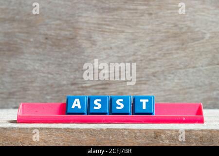 Alphabet letter in word asst (abbreviation of assistant) on wood ...