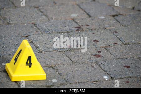 Blood stains on pavement after a violent incident Stock Photo - Alamy