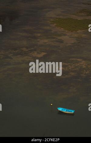 Breathtaking drone view of boat floating in sea near contemporary ...