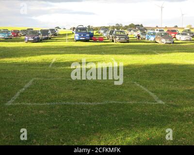 White squares marked out for social distancing of picnickers at a ...
