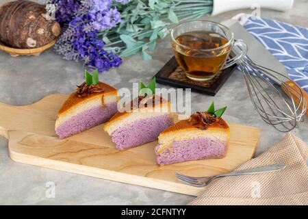 piece of taro chiffon cake topped with Thai taro custard and fried ...