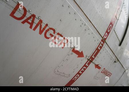 hazard sign on an old airplane hull Stock Photo - Alamy