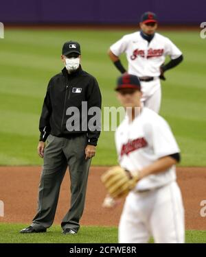 MLB umpire James Hoye (92) and Minnesota Twins manager Derek Shelton (8 ...