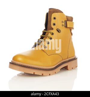 Yellow winter boot isolated on white Stock Photo - Alamy