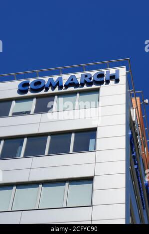 POZNAN, POLAND - Aug 26, 2016: Top of a modern office building with ...