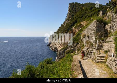 A view of a the rocky cliff in the sea Stock Photo - Alamy