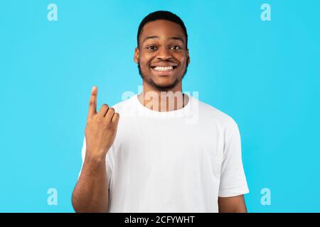 man showing his first finger Stock Photo - Alamy