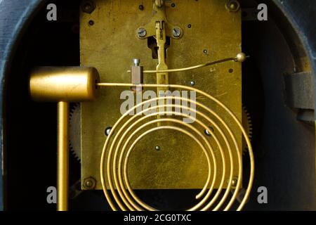 The internal clock mechanism and macro Stock Photo - Alamy