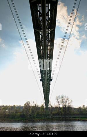 Steel support of boiler pipe in the factory on blue dark night sky ...