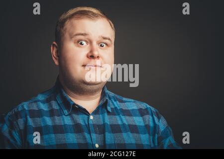 Sad overweight man looking at fat belly mirror reflection, weight loss ...