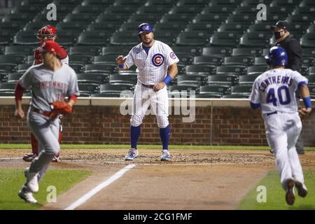 Chicago Cubs left fielder Kyle Schwarber, left, right fielder Jason ...