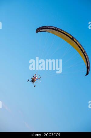 Power paraglider against a blue sky Stock Photo - Alamy