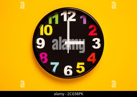 Wall clock show three o'clock on white marble texture. Office clock ...