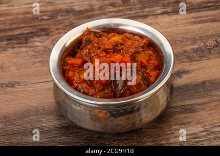 Tasty Eggplant saute with tomato and herbs Stock Photo - Alamy