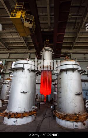 Titanium metallurgy. Melting of titanium in vacuum furnace Stock Photo ...