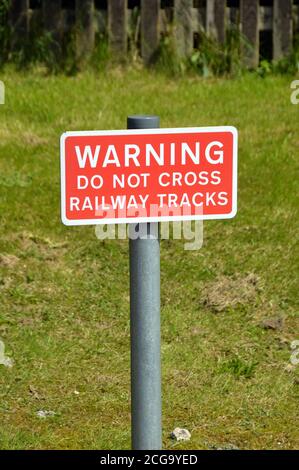 Danger Do Not Cross Tracks sign Stock Photo - Alamy