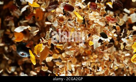 Freeze motion of flying group of cereal breakfast mix. Healthy eating ...