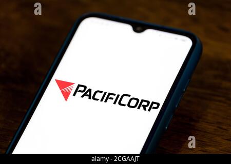 In this photo illustration, the PacifiCorp logo is displayed on a ...
