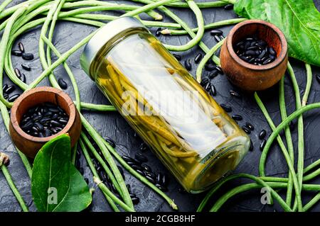 Cowpea pods with beans and a jar of canned cowpea.Vegetable plant Stock ...